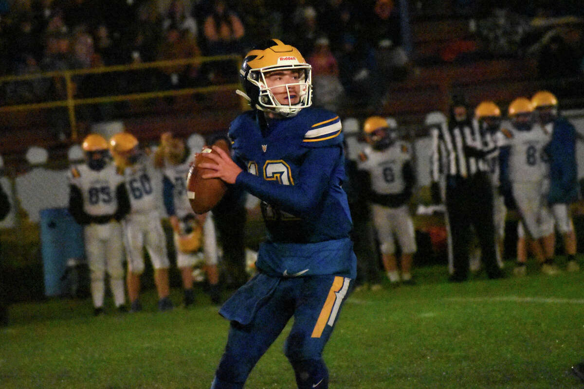 Evart football powers past Harrison while honoring local eighth grader