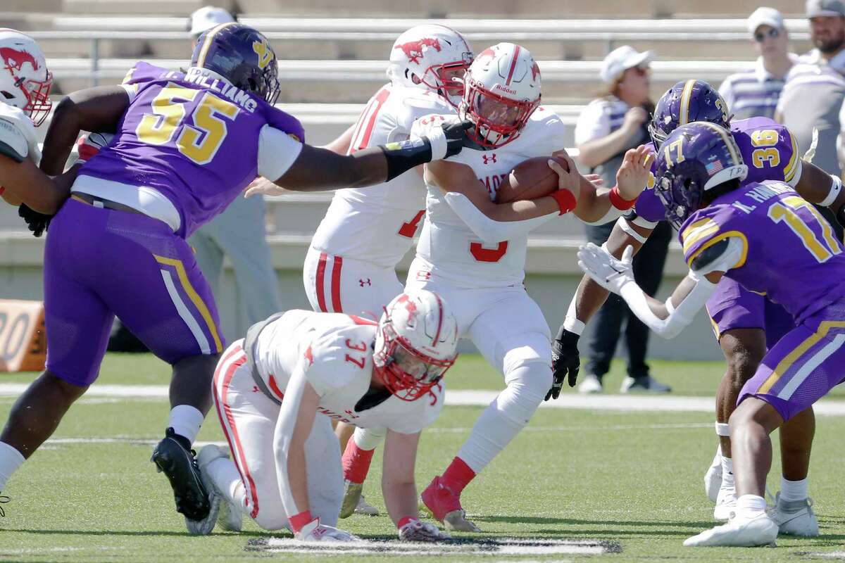 HS football: Memorial dominates early to topple Jersey Village