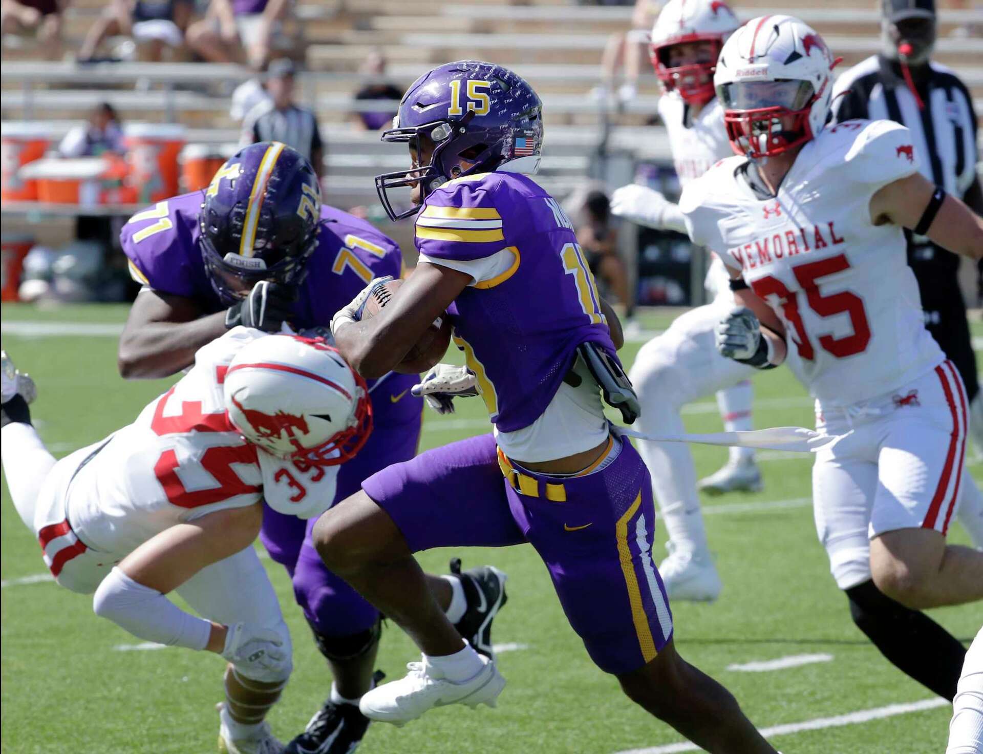 HS football: Memorial dominates early to topple Jersey Village