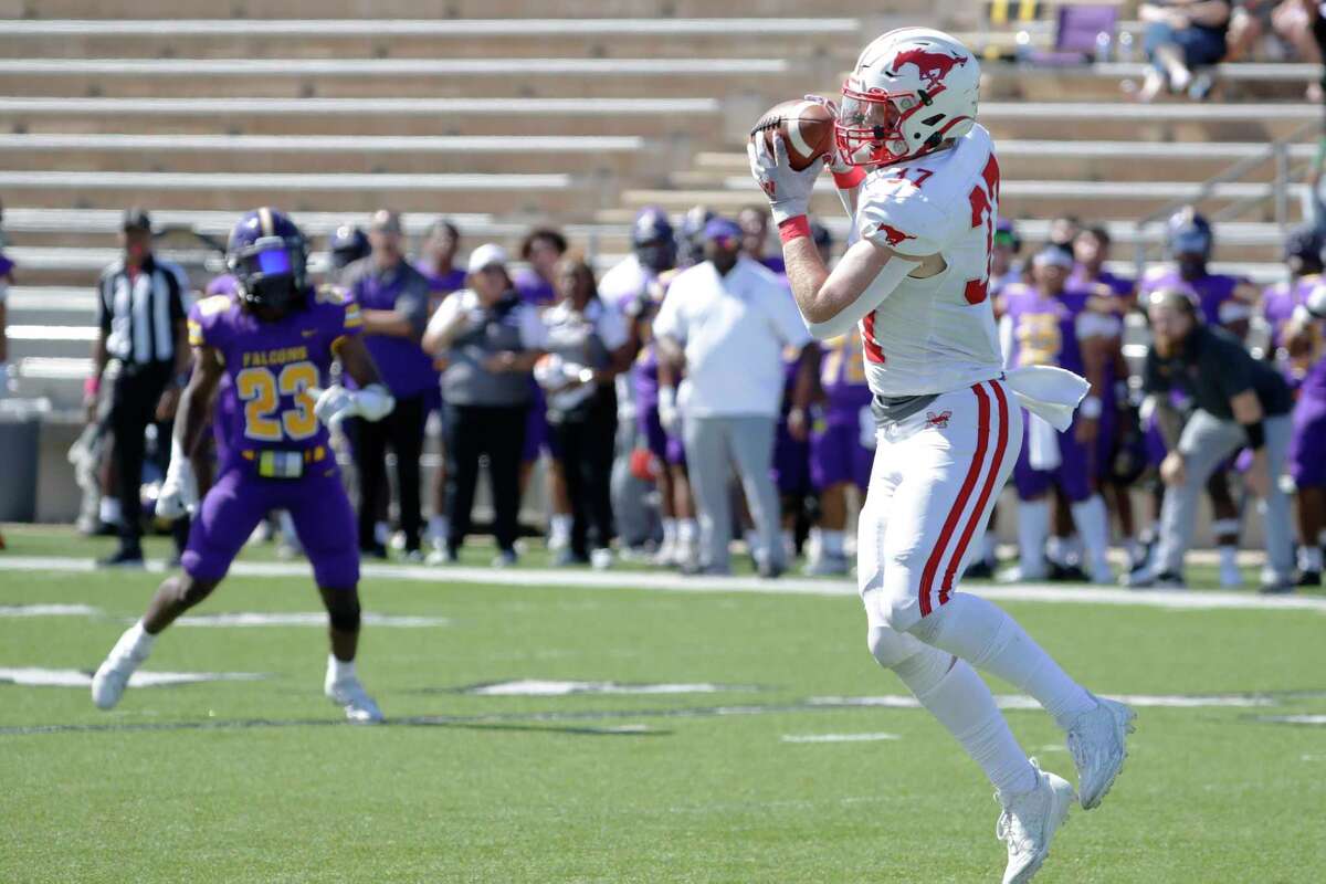 HS football: Memorial dominates early to topple Jersey Village