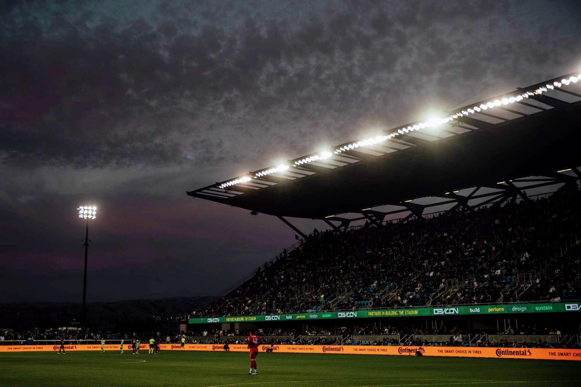 How John Fisher runs Earthquakes: Like A’s, but he shows up for them