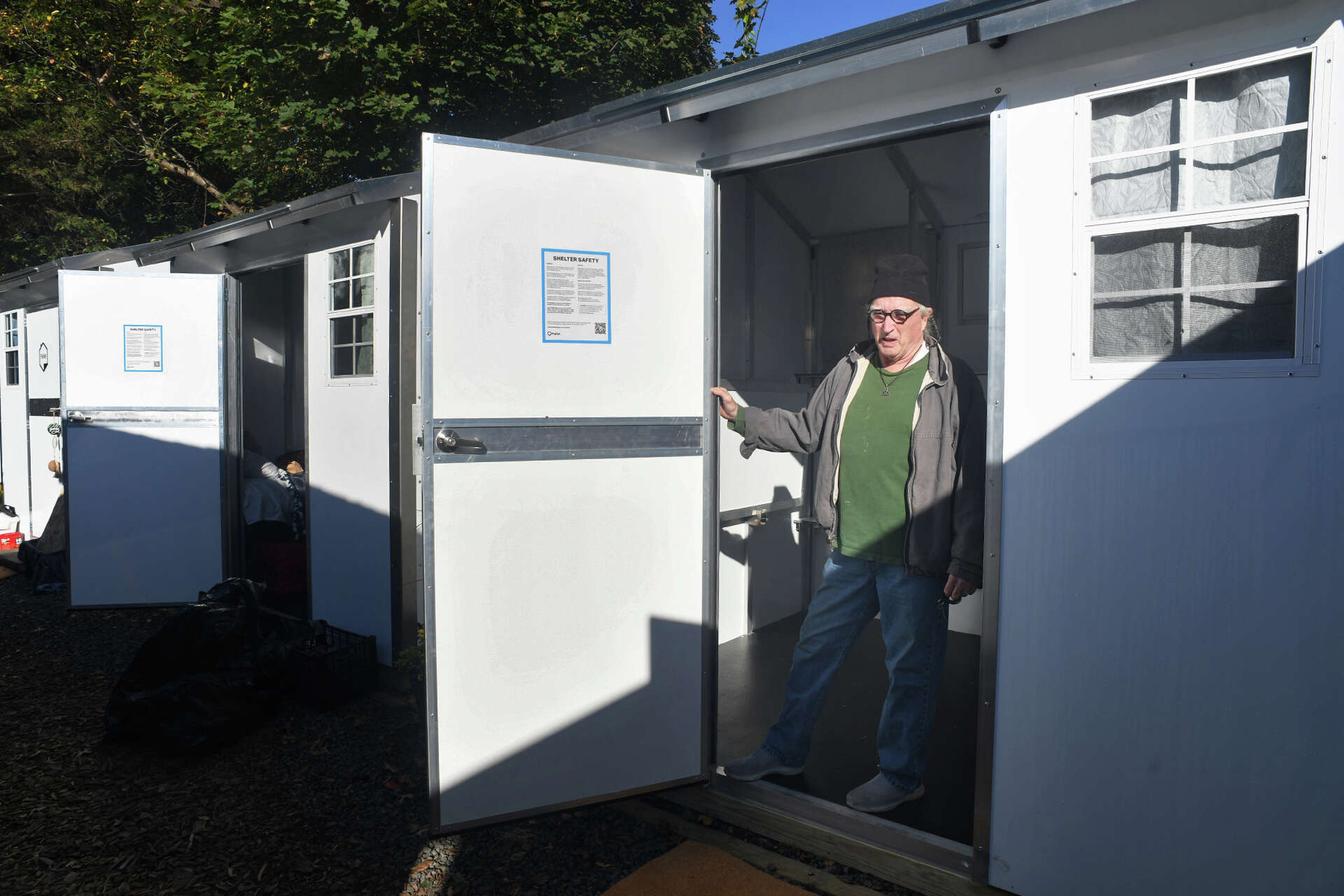 In a New Haven backyard, tiny homes represent hope for homeless people