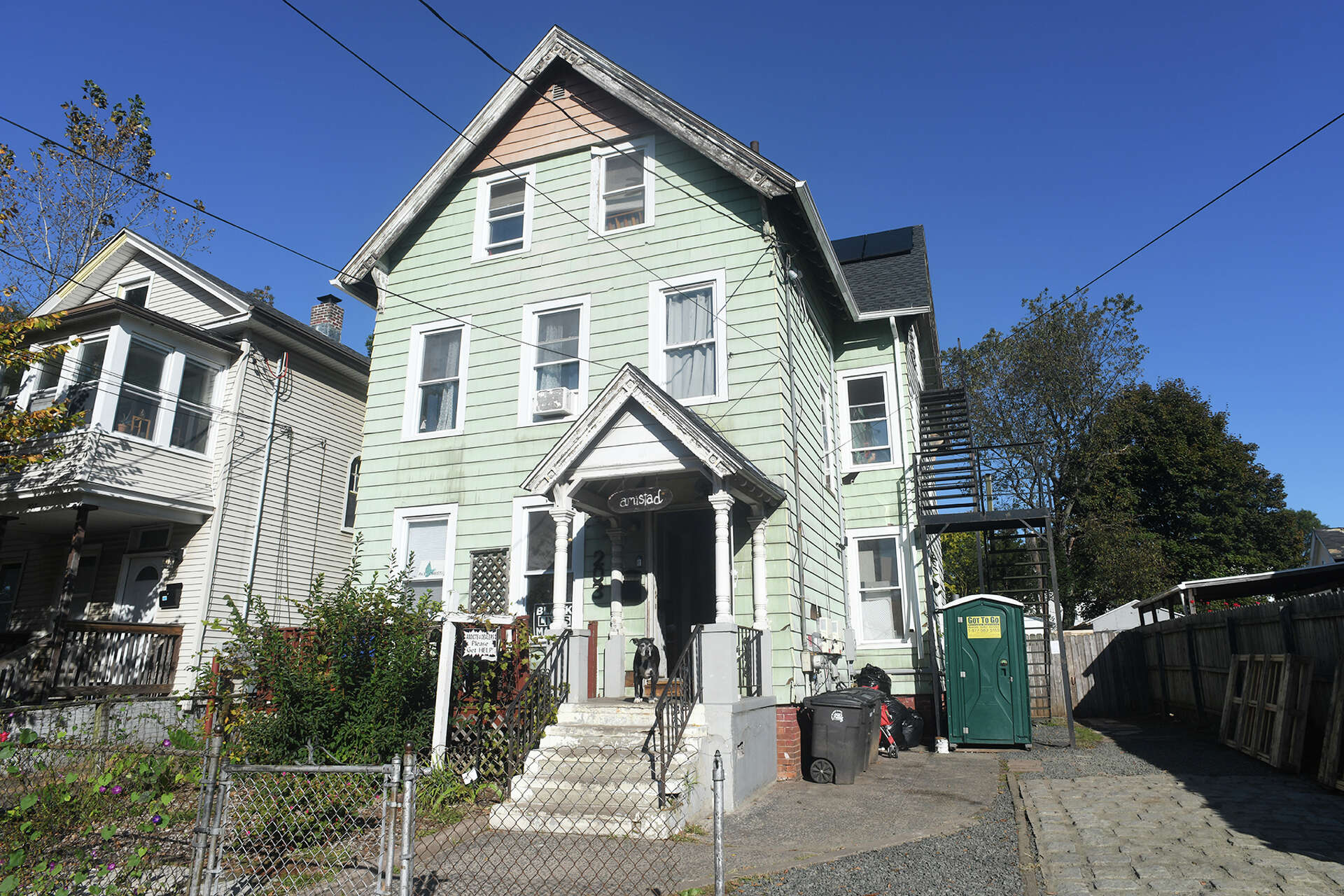 In a New Haven backyard, tiny homes represent hope for homeless people