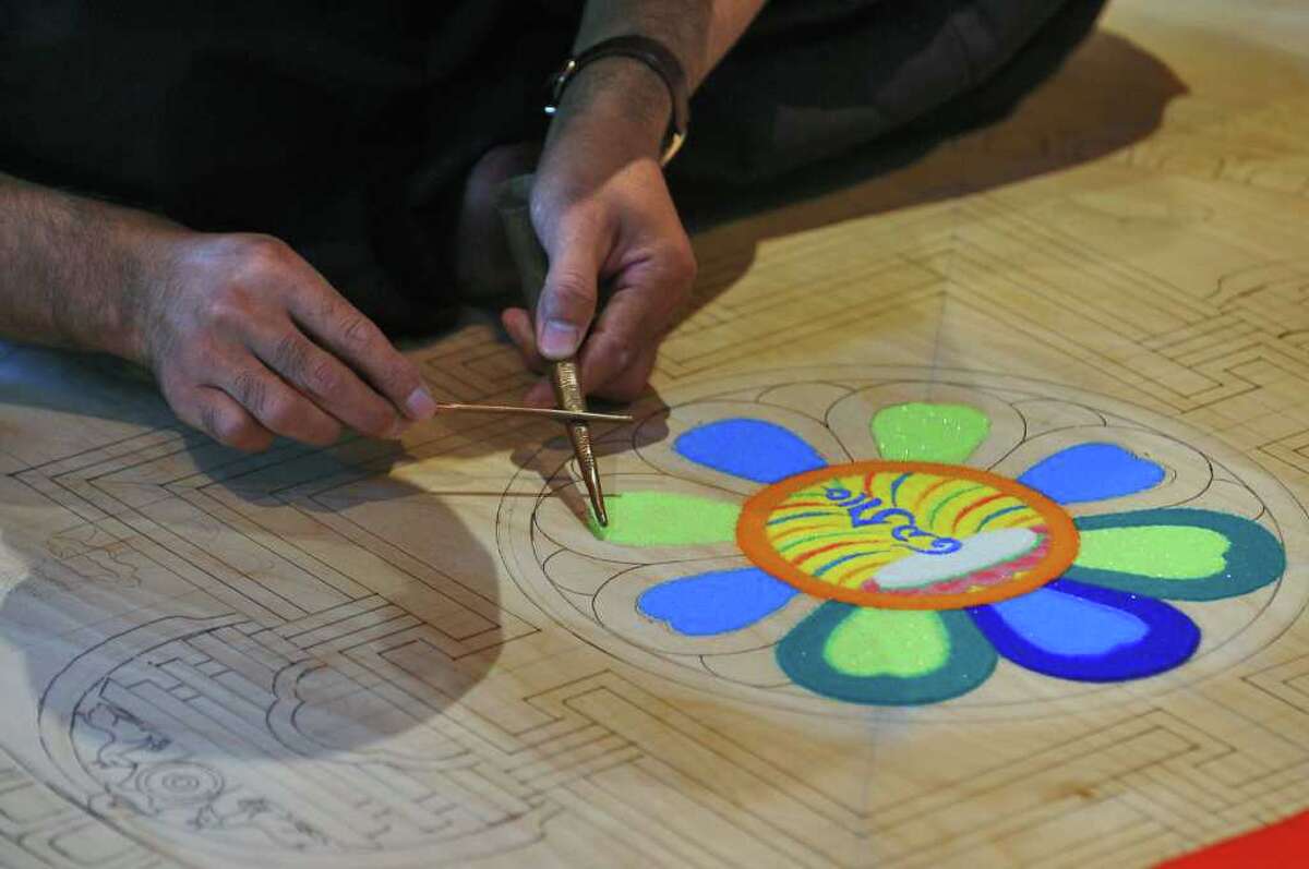 Photos: Monk creates mandala