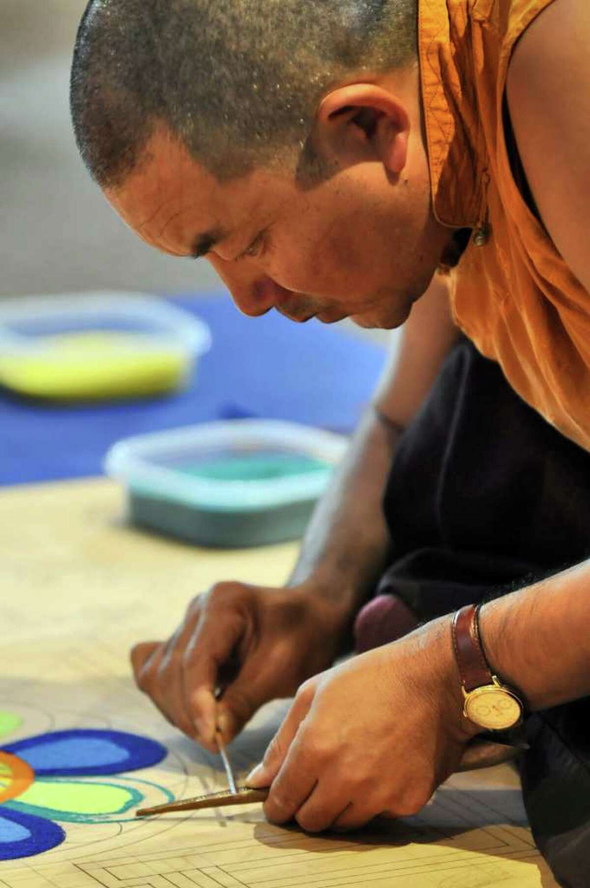 Photos: Monk creates mandala