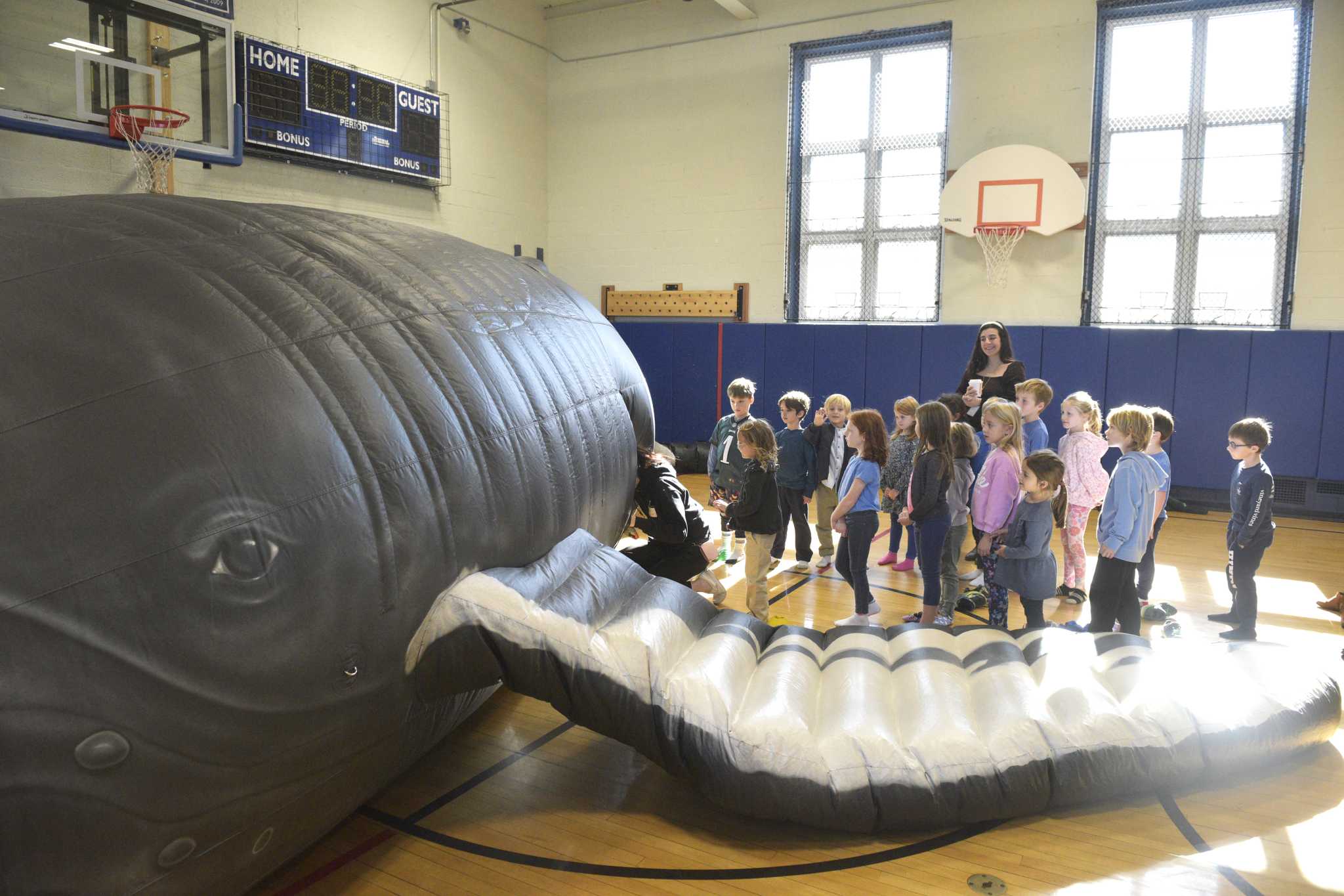 Hindley elementary students learn inside the life sized Whalemobile