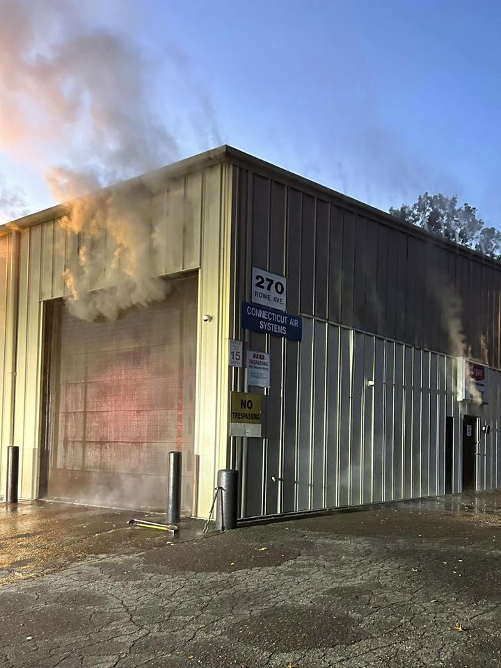 Van fire in Milford building under investigation, official says