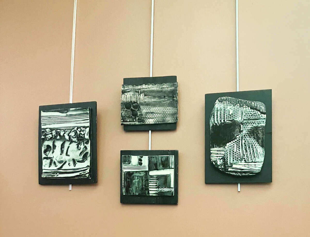 Wangunk father, daughter showing Indigenous artwork in Middletown