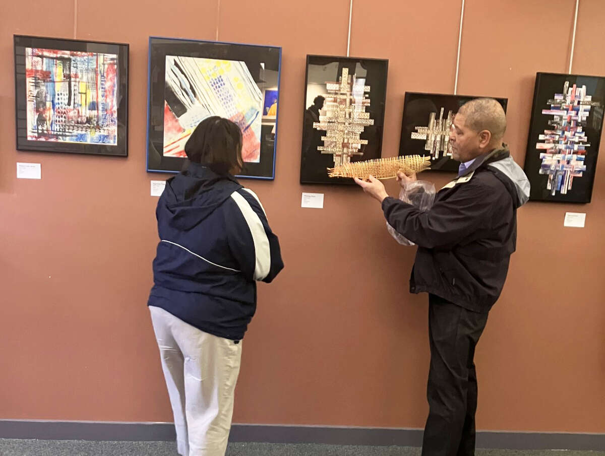 Wangunk father, daughter showing Indigenous artwork in Middletown