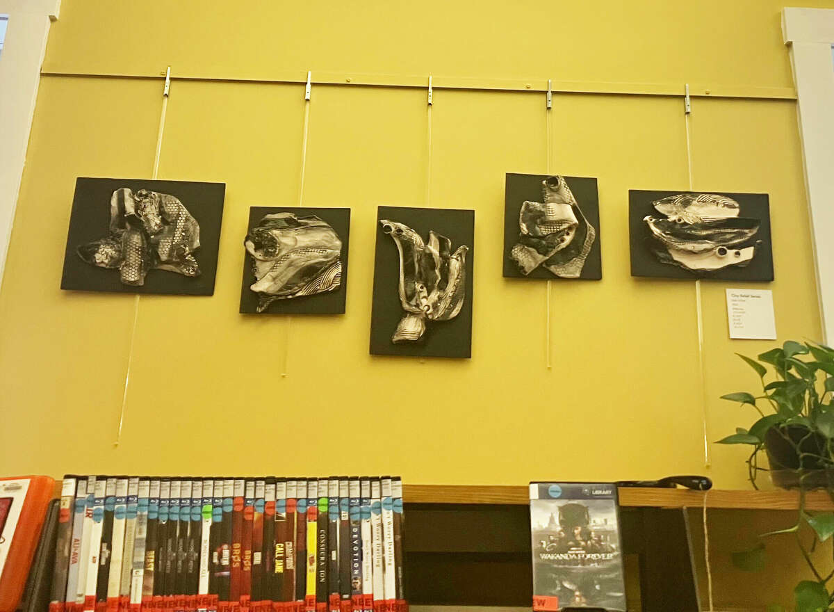 Wangunk father, daughter showing Indigenous artwork in Middletown