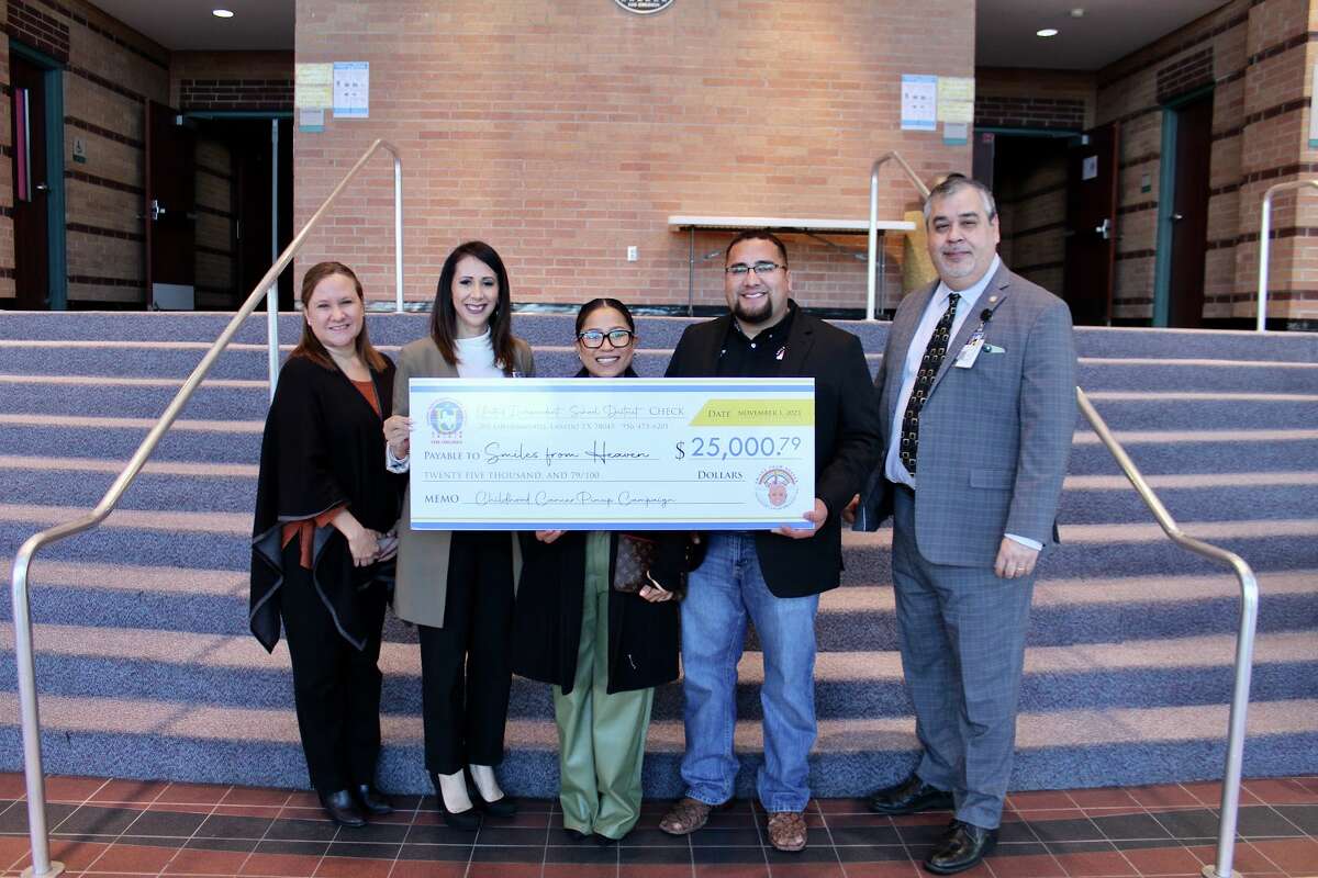 UISD presents donation check to Smiles from Heaven Childhood Cancer Or