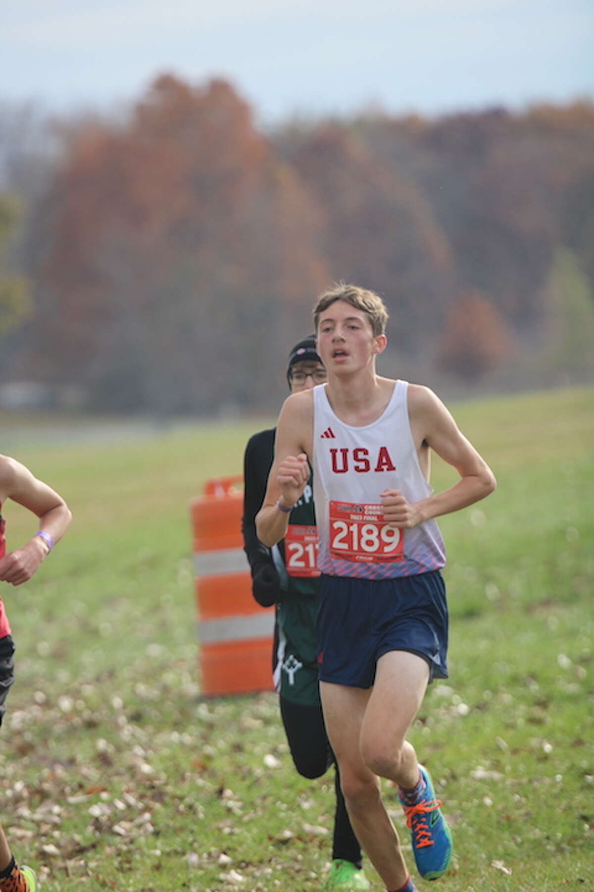 Thumb runners make strides at cross country state finals