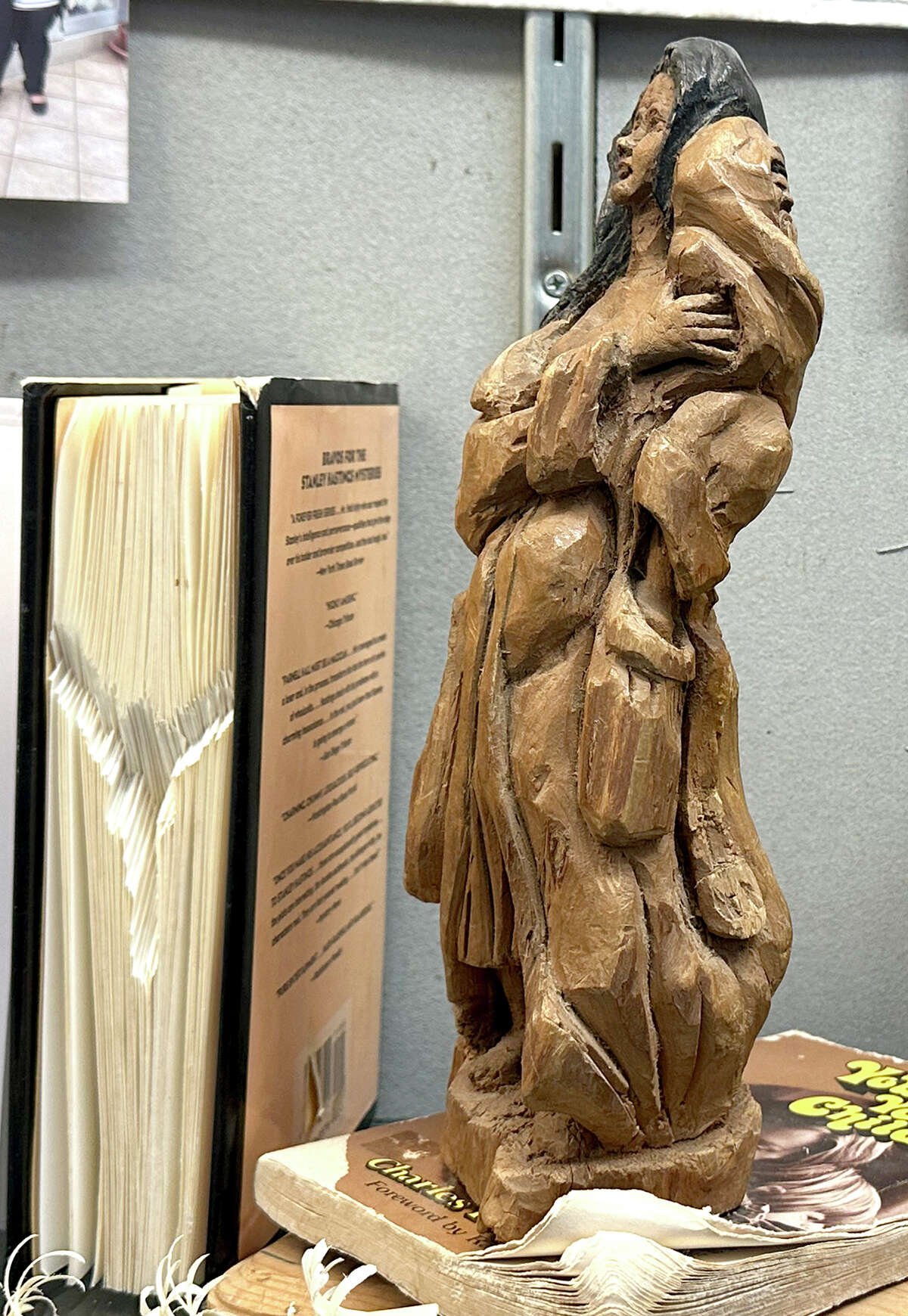 Veteran Herman Davis known for wood carvings turns to book art