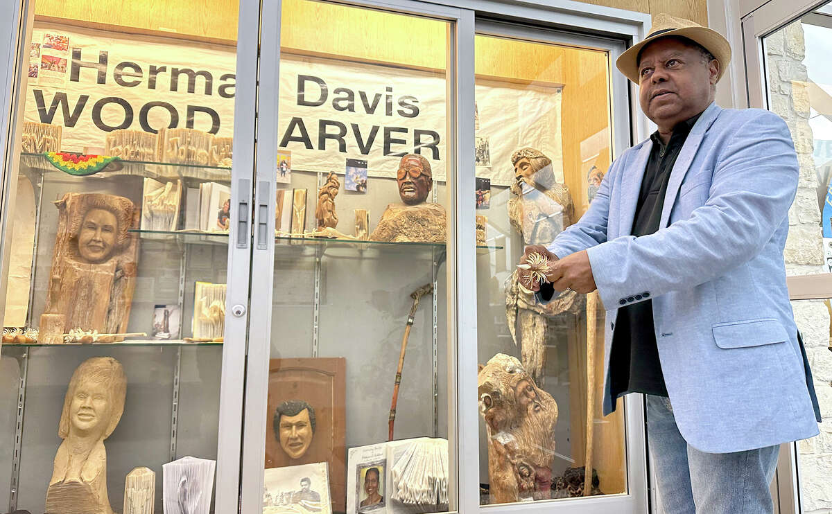 Veteran Herman Davis known for wood carvings turns to book art