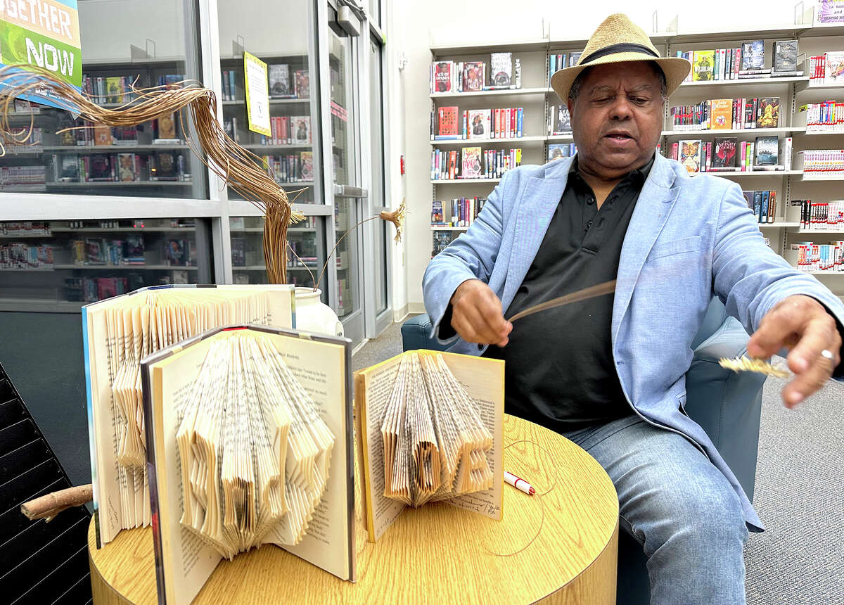 Veteran Herman Davis known for wood carvings turns to book art