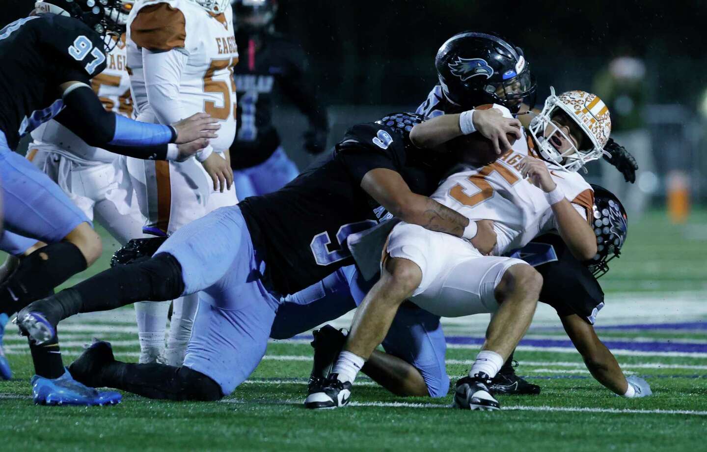 Harlan football holds off Eagle Pass in bi-district playoff