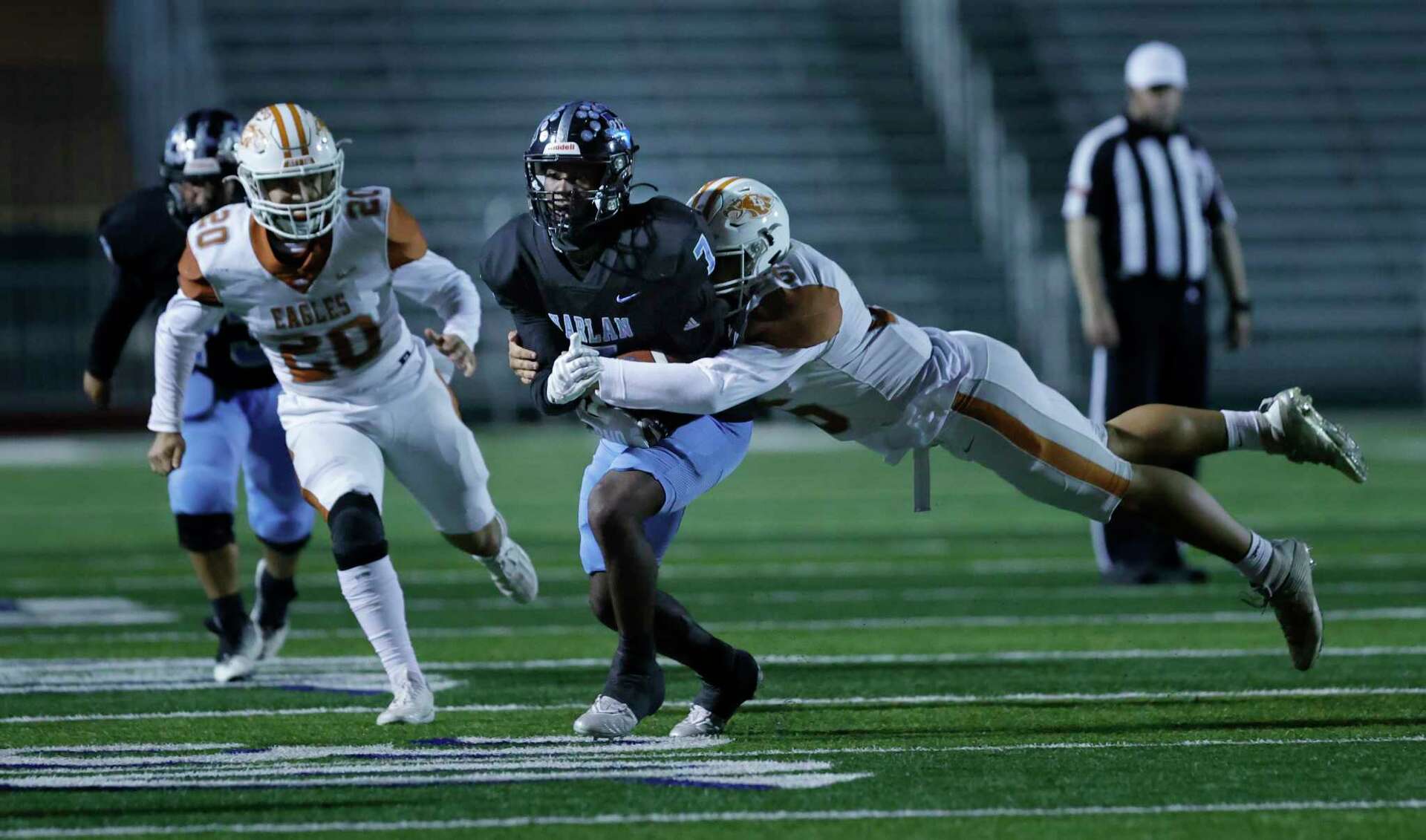 Harlan football holds off Eagle Pass in bi-district playoff