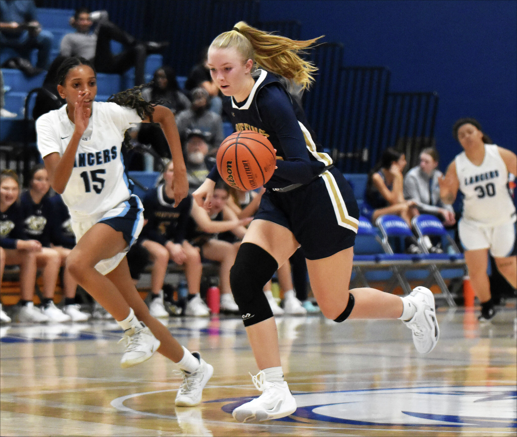 Ellis keys FMCHS victory with late 3-pointers against Belleville East