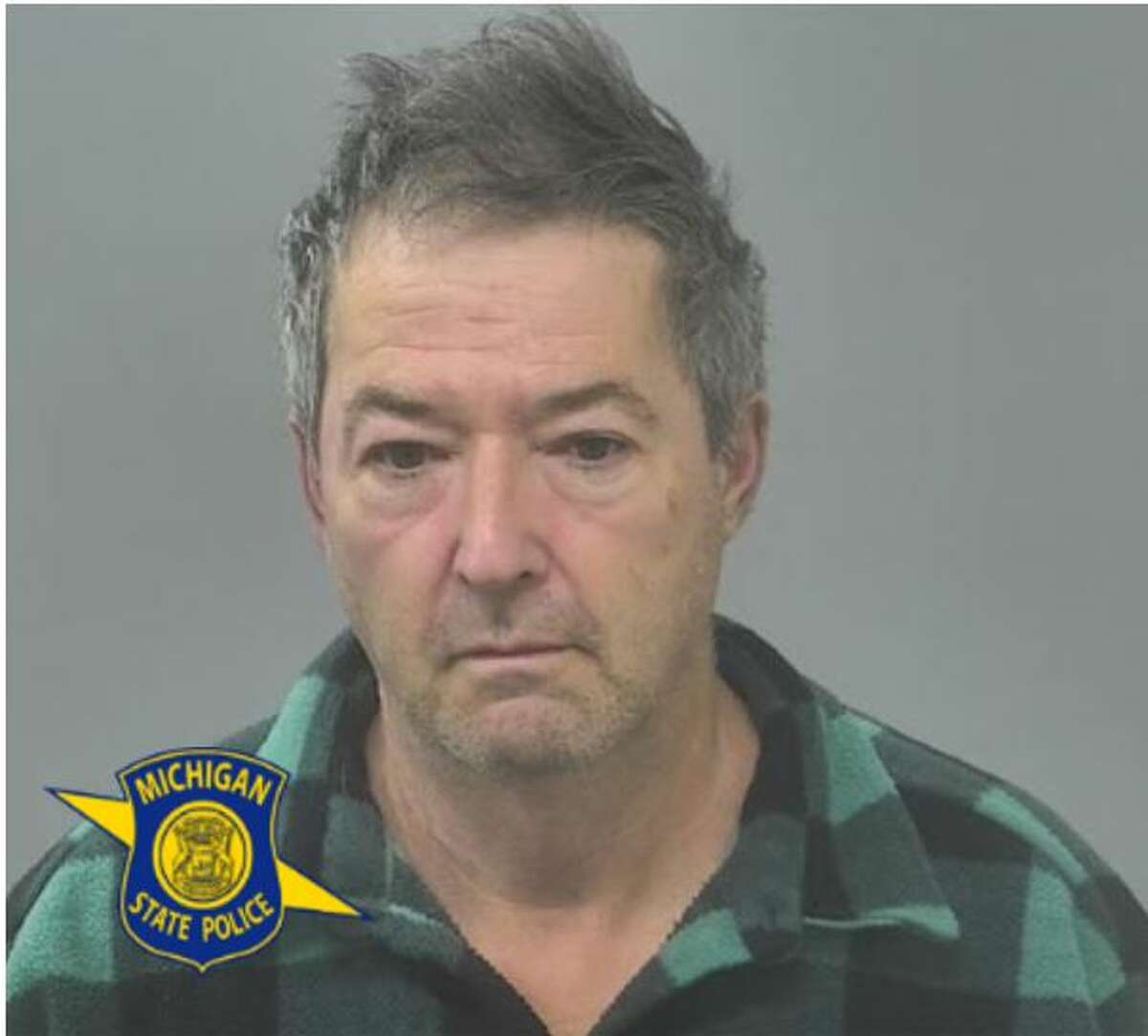 Midland man, 61, arrested with weapons following flat tire in Alpena