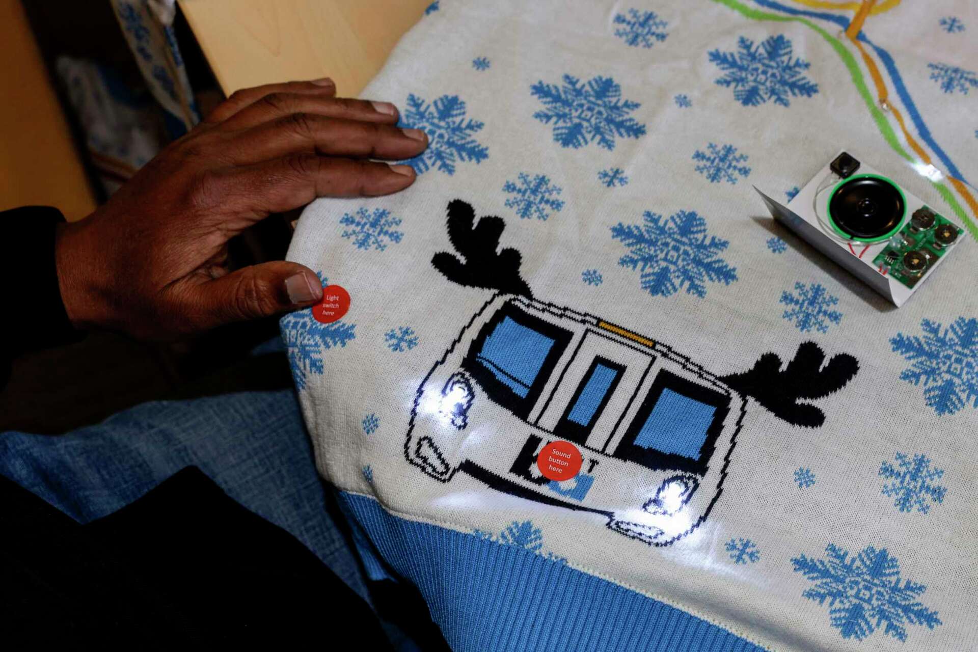 BART unveils its 2023 ugly holiday sweaters — with lights and sound