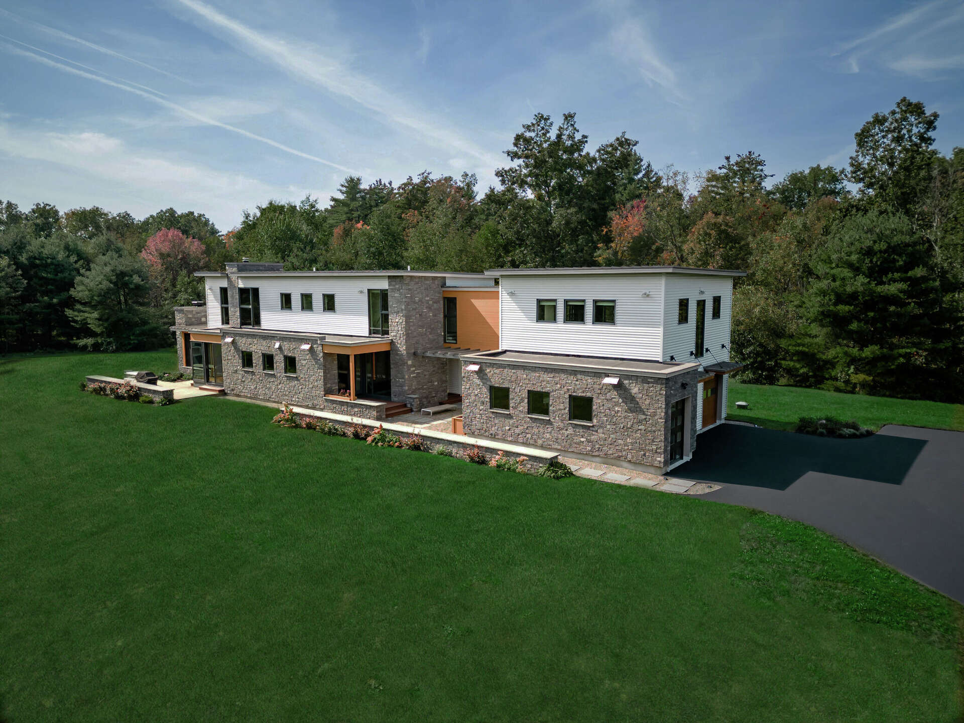 Custom contemporary in Stillwater has 5 bedrooms, for sale at $1.35M