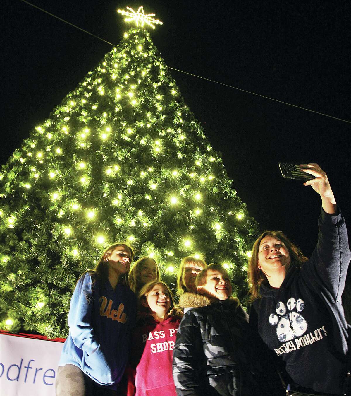 Alton's Community Christmas Tree lights up downtown