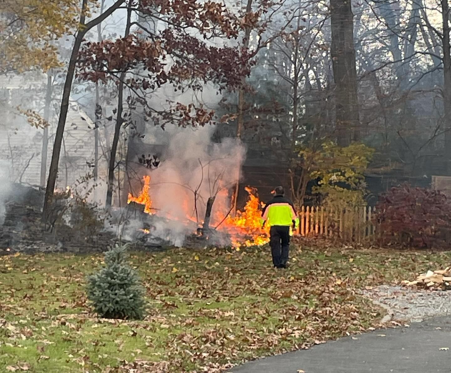 Officials: Cheshire firefighters save three homes from brush fire