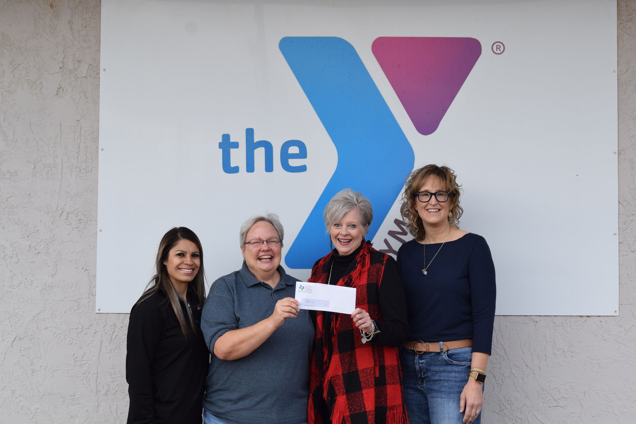 Plainview YMCA receives donation from EDC for new roof