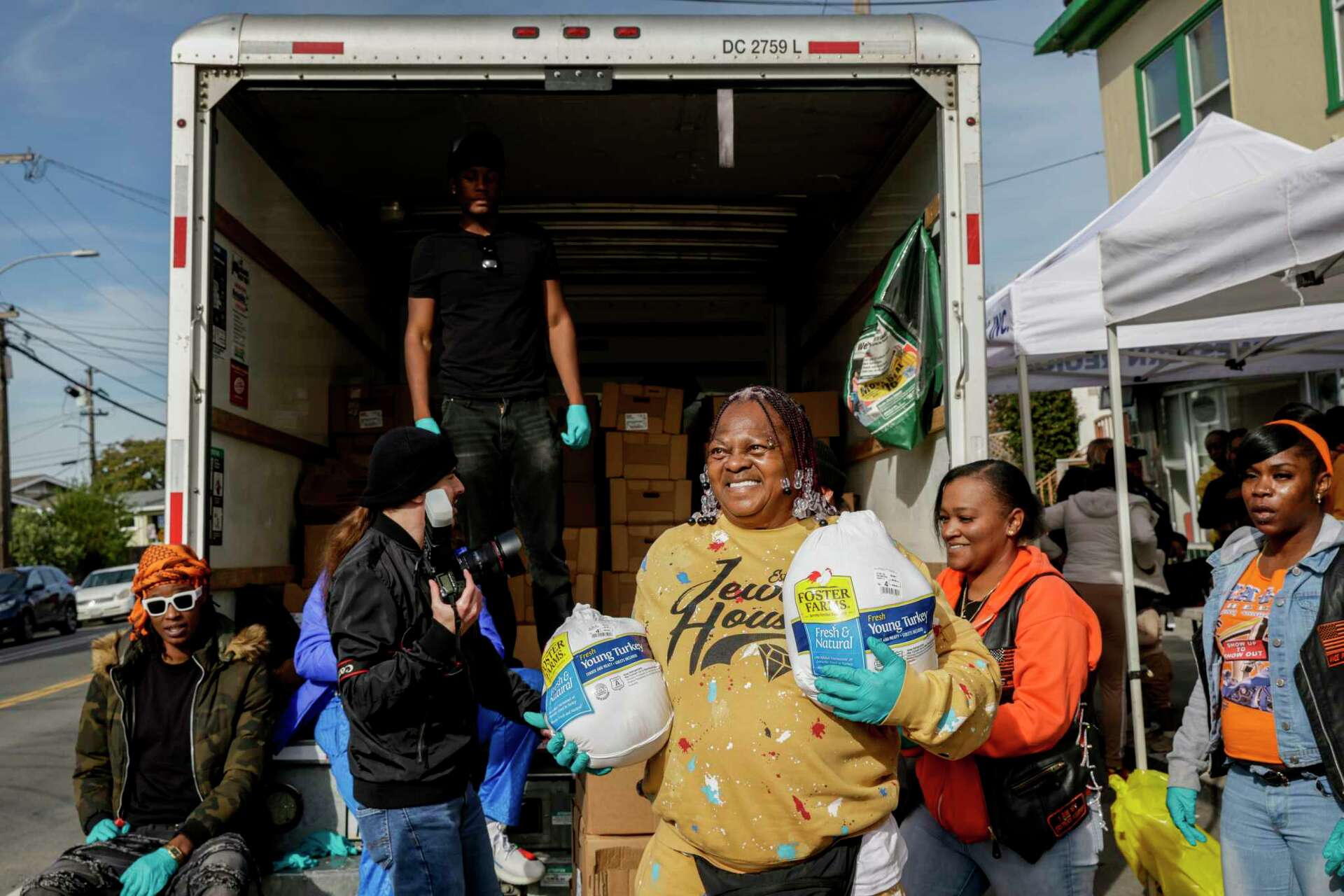 Feel-good Thanksgiving traditions: Rappers holding turkey giveaways