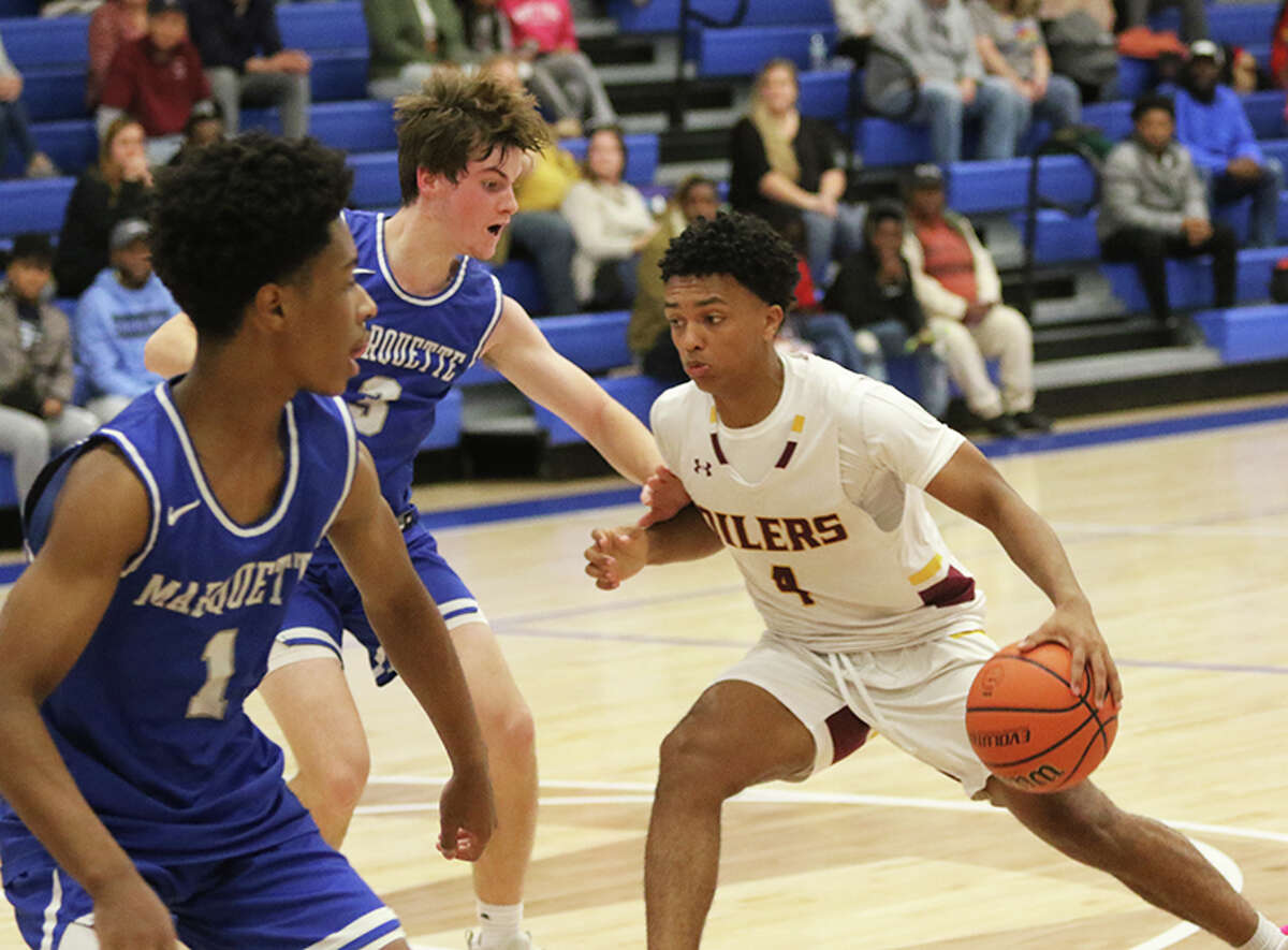 Explorers beat Oilers in Hoopsgiving reunion for former Dogs