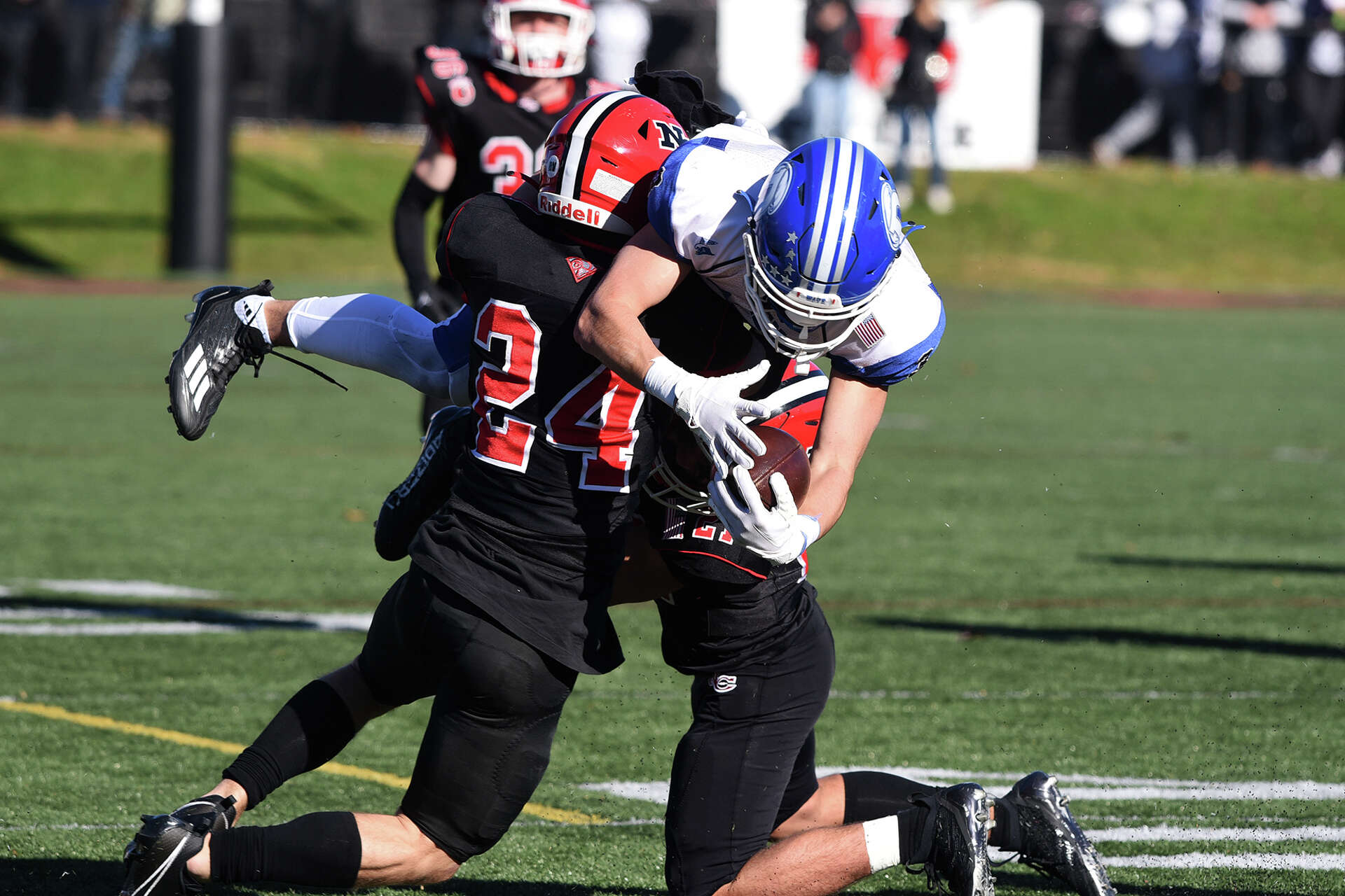 New Canaan toppled Darien behind three TDs from Alex Banevento