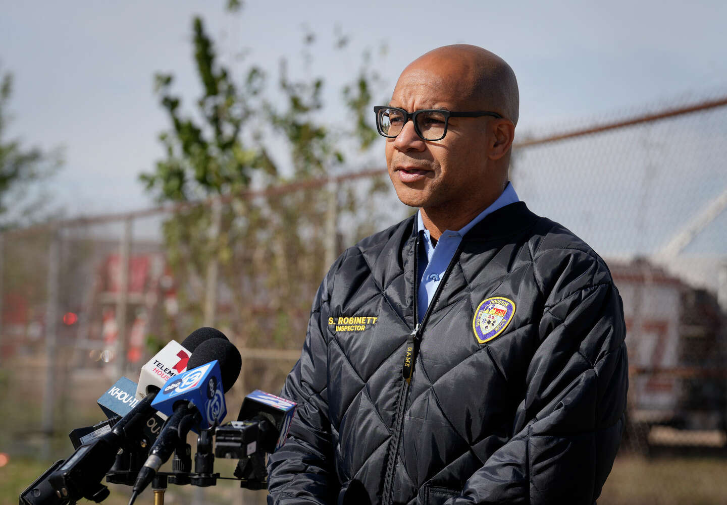 Houston fire: Crews working to put out warehouse fire, roof partially