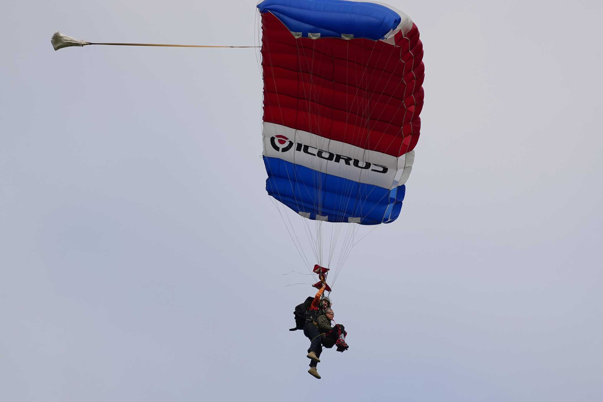 Greg Abbott roasted for skydiving with 106-year-old WWII vet