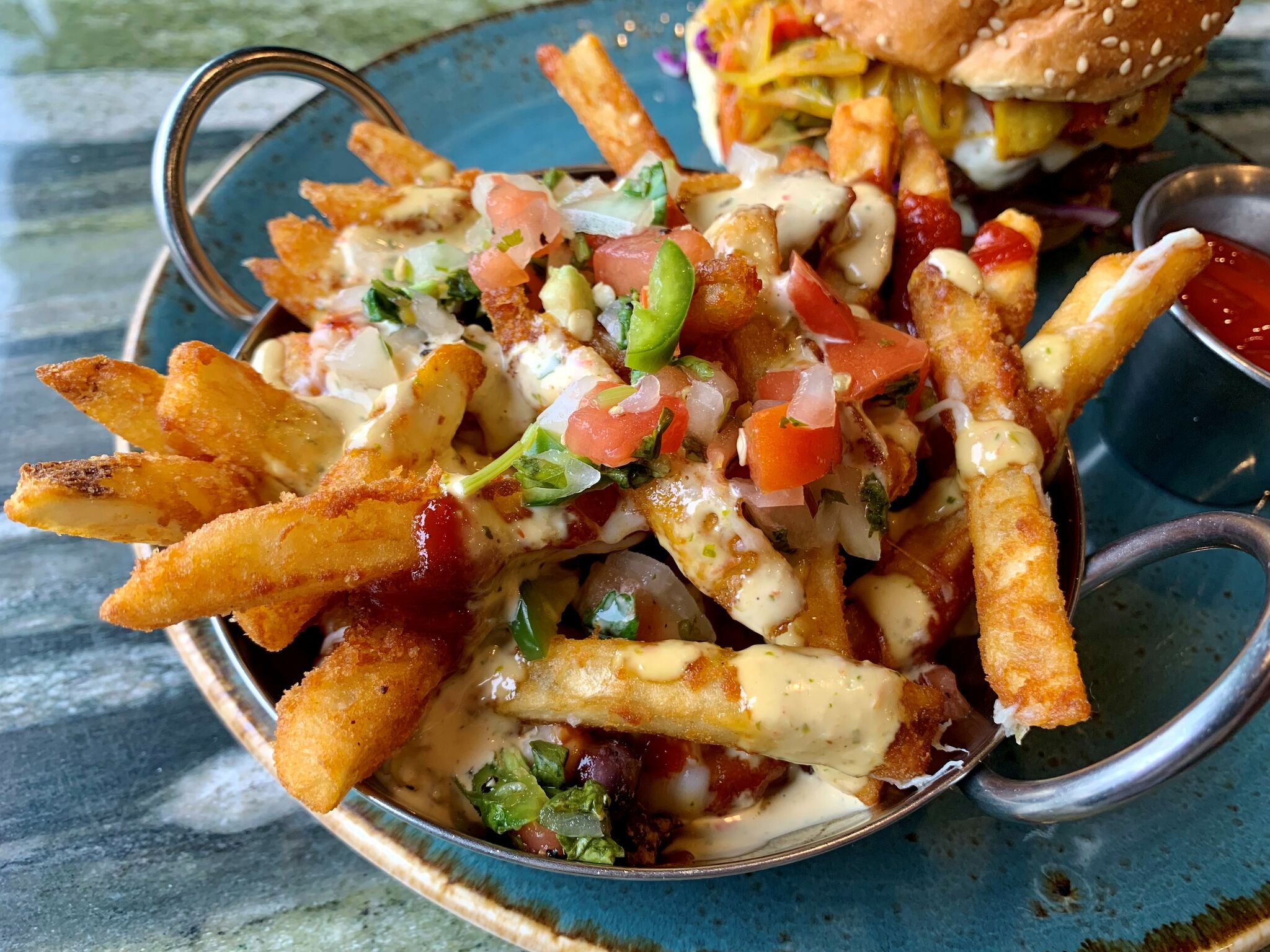 These loaded fries at Cowboys and Indians made believer out of critic