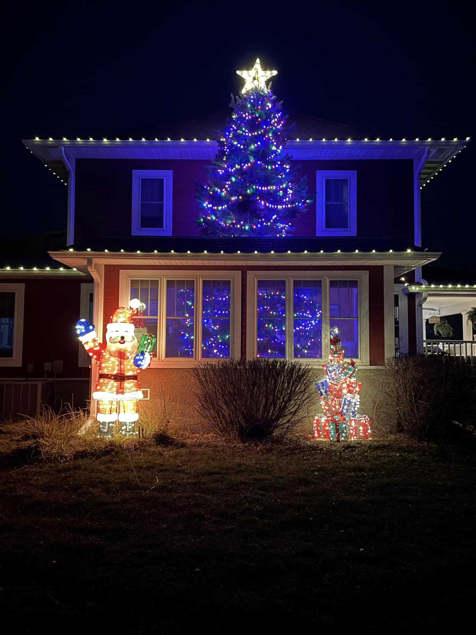 Look closely: This Iowa Christmas tree seems to go straight through roof