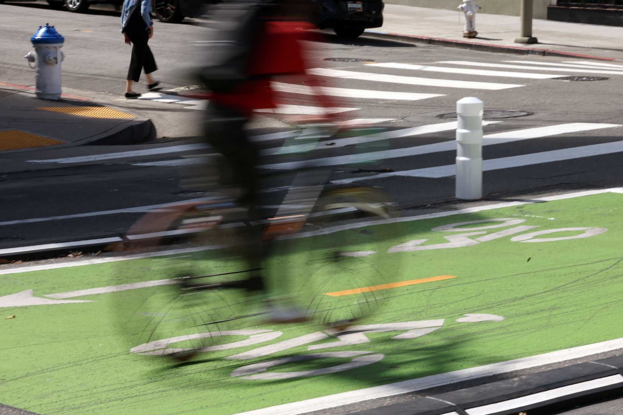 Valencia Street’s contentious center lane bikeway to remain — for now