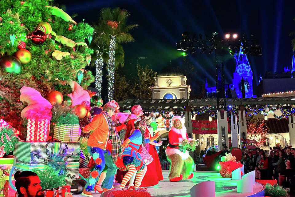It's the Grinch's world at Universal Studios. We're just living in it.