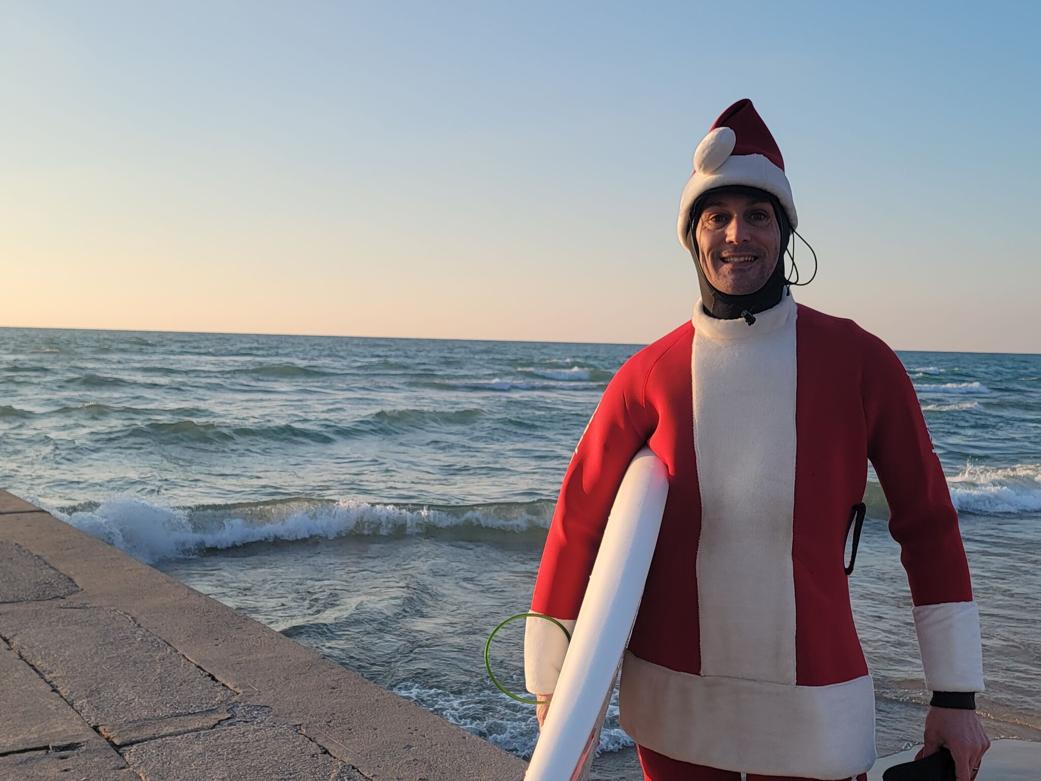 Frankfort resident kicks off holidays as surfing Santa