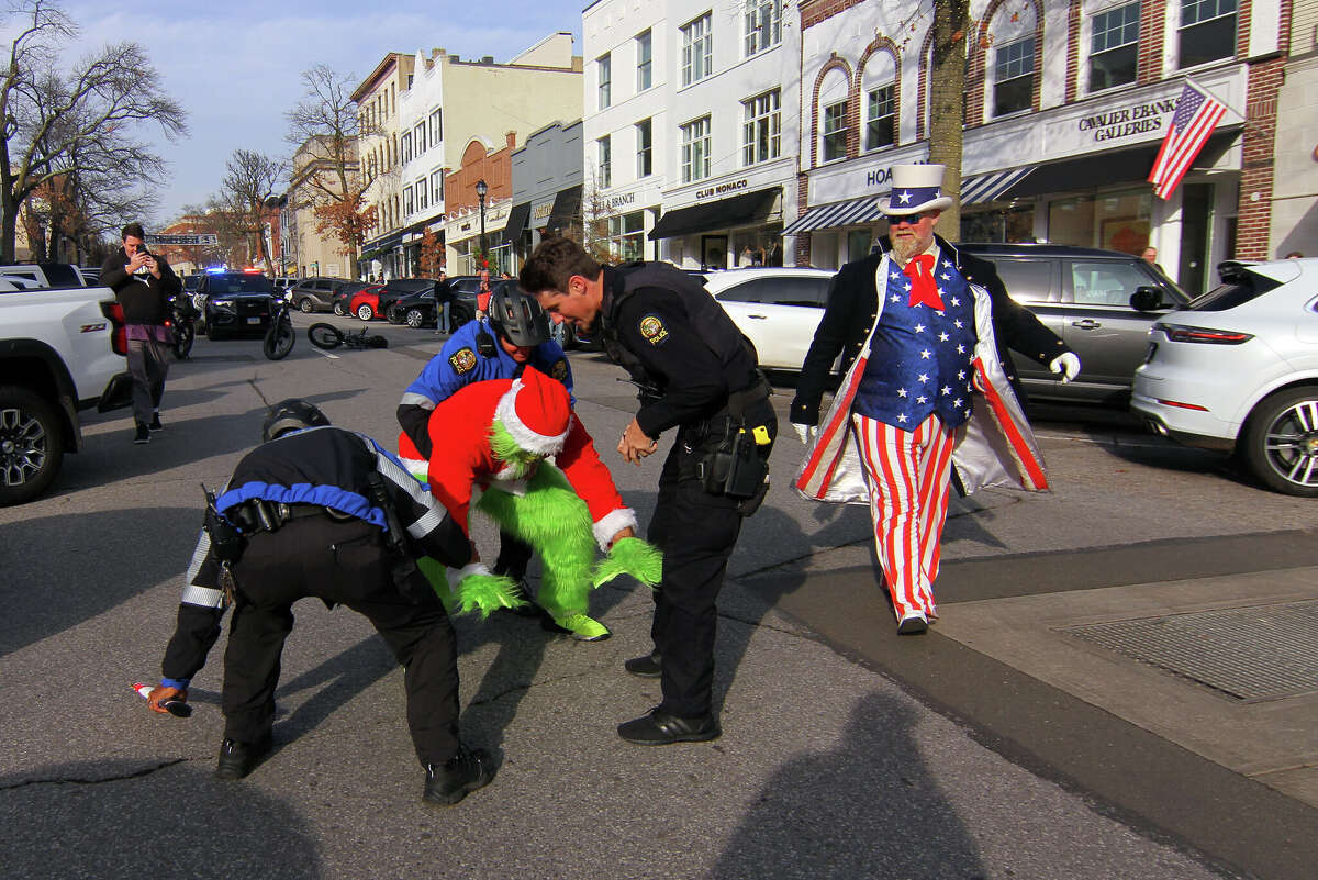 In photos: Greenwich police 'arrest' Grinch on Greenwich Ave.