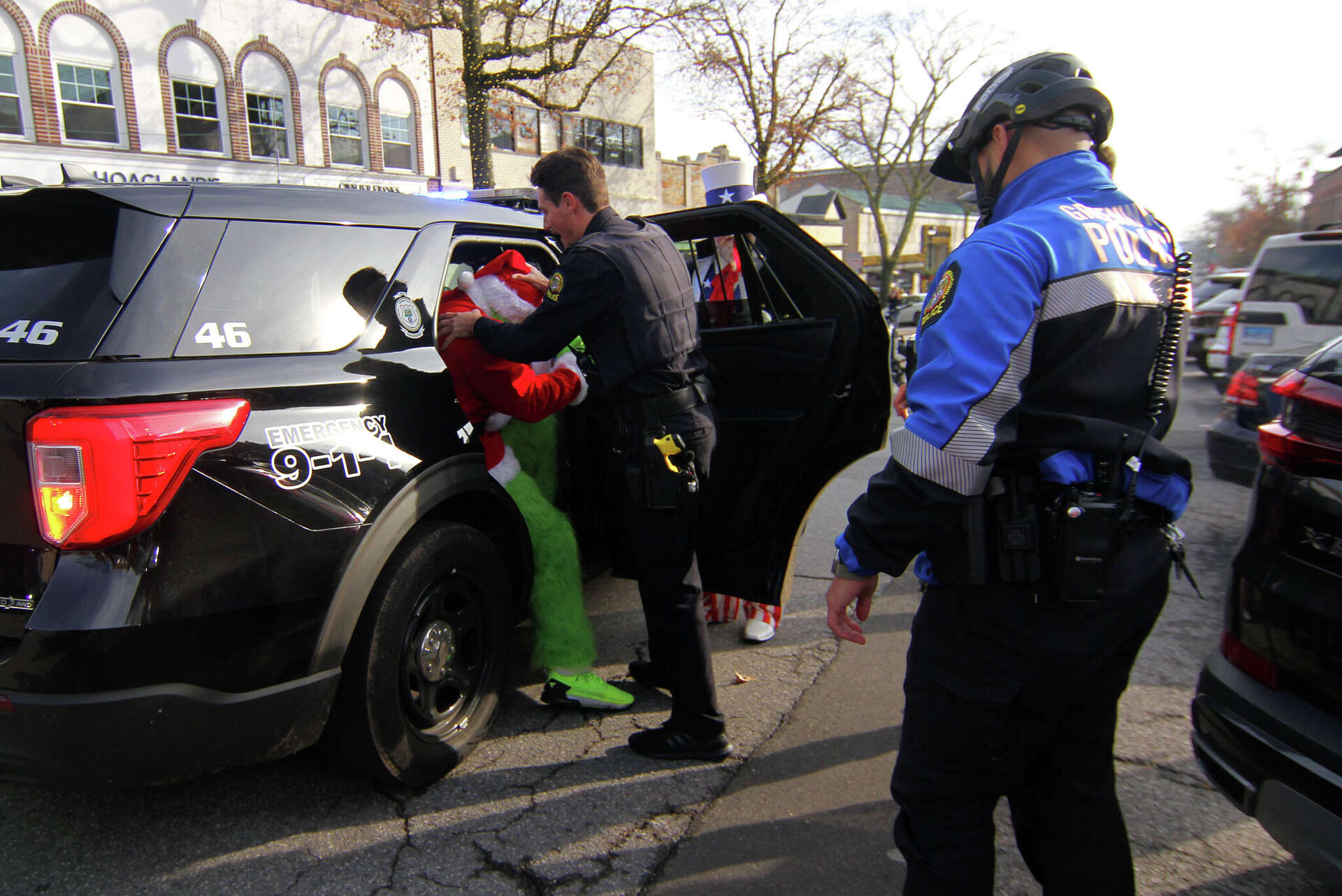 In photos: Greenwich police 'arrest' Grinch on Greenwich Ave.