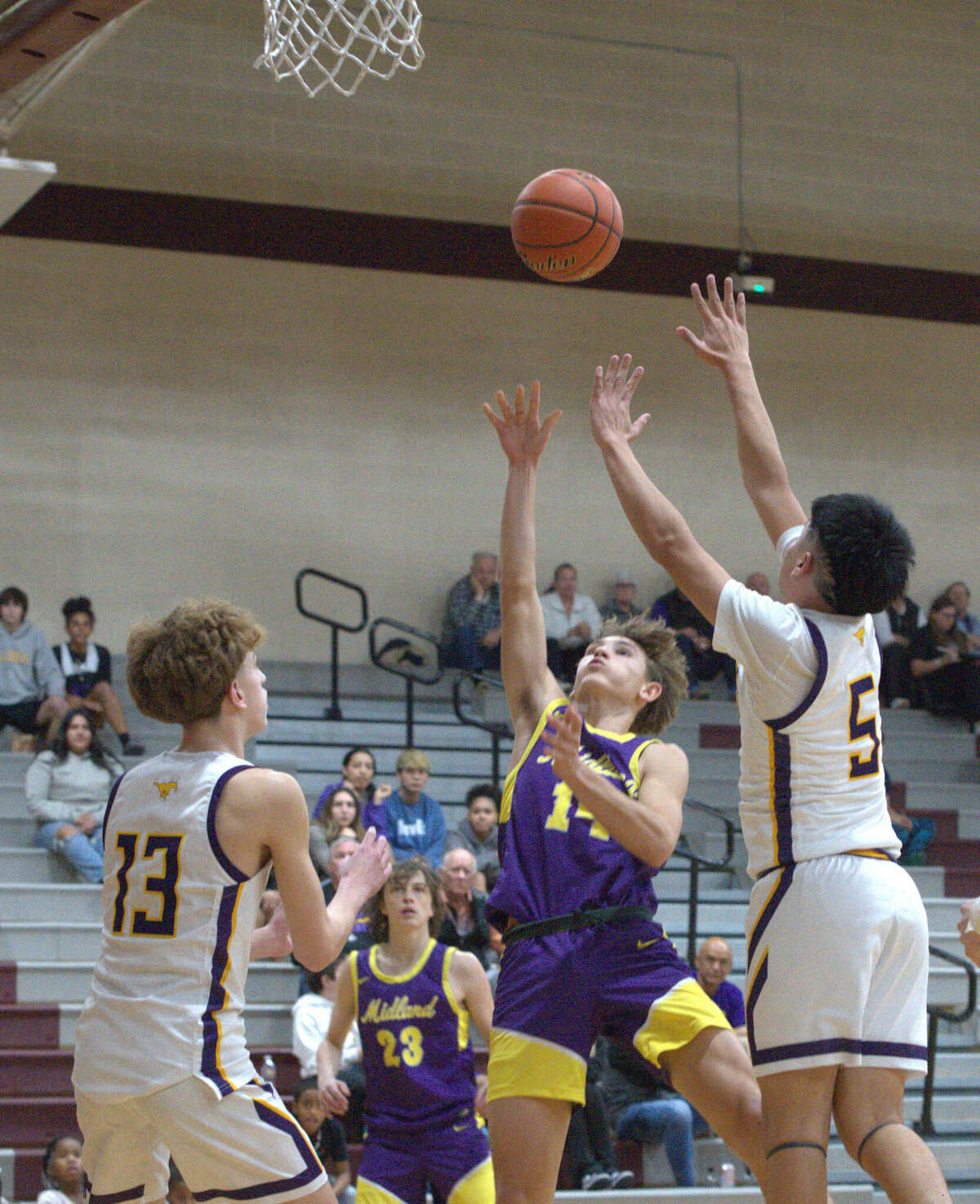 HS BOYS BASKETBALL: MHS makes plays late to beat Burges