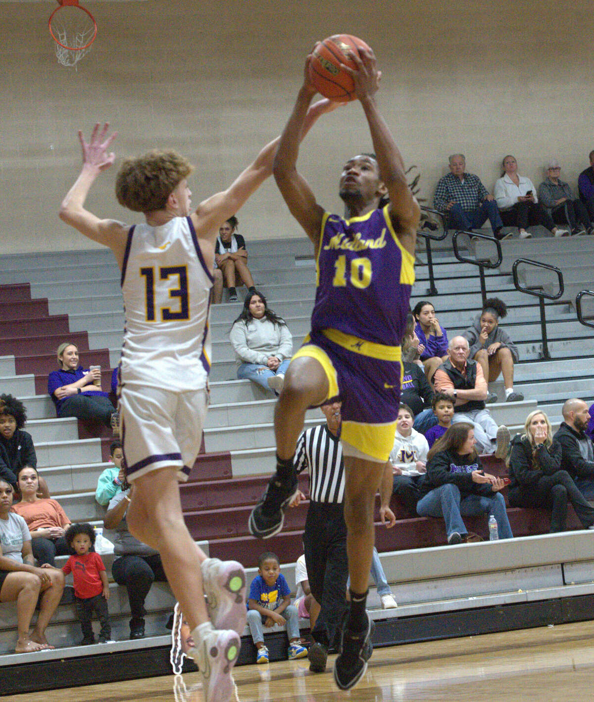 HS BOYS BASKETBALL: MHS makes plays late to beat Burges