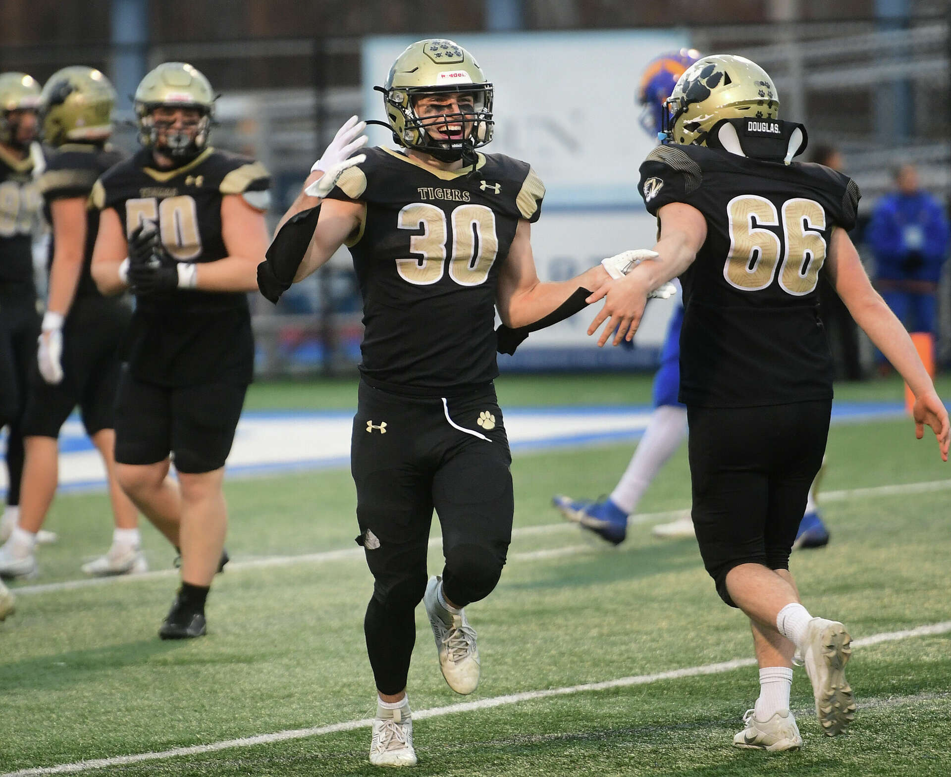 Hand rolls to CIAC Class M championship with 57-20 win over Rockville