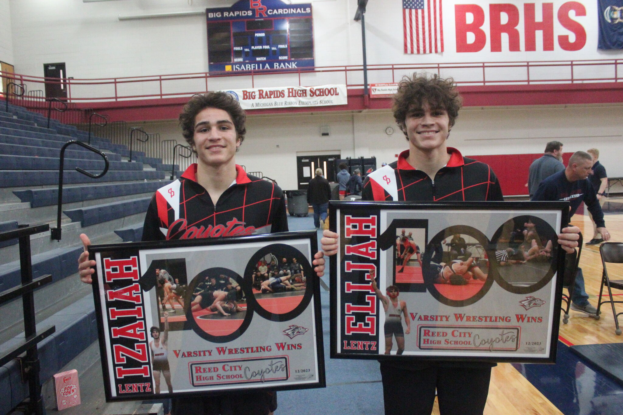 Izaiah and Elijah hit century win marks for wrestling the same day