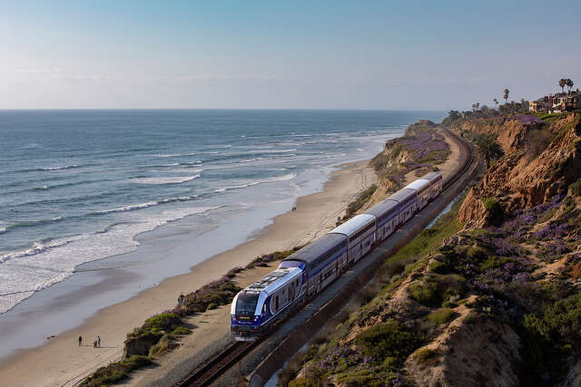 Amtrak train crashes into big rig, closing Calif. freeway temporarily