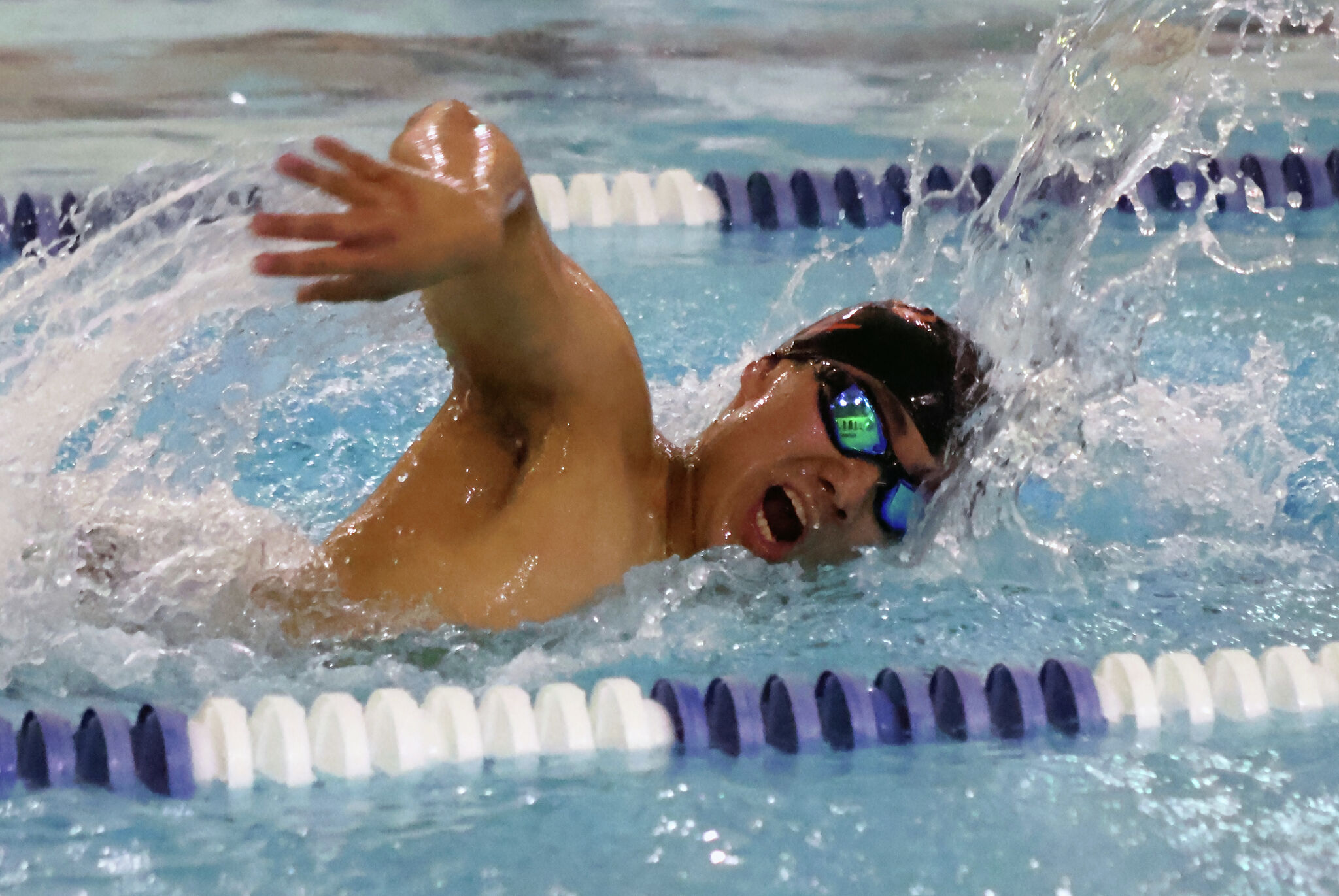 Tigers open boys swim and dive season with win