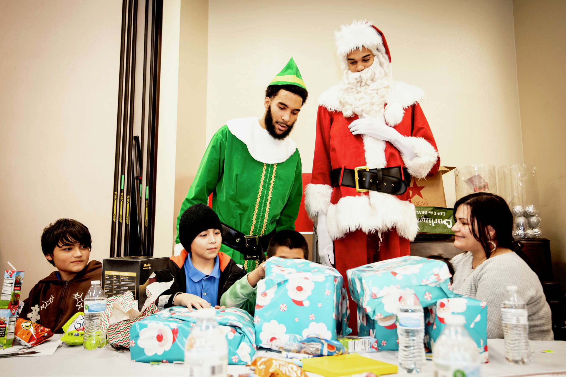 Spurs' Wembanyama plays Santa to deliver gifts for Elf Louise