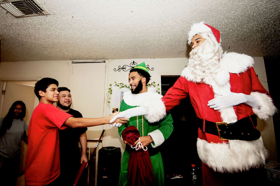 Spurs' Wembanyama plays Santa to deliver gifts for Elf Louise