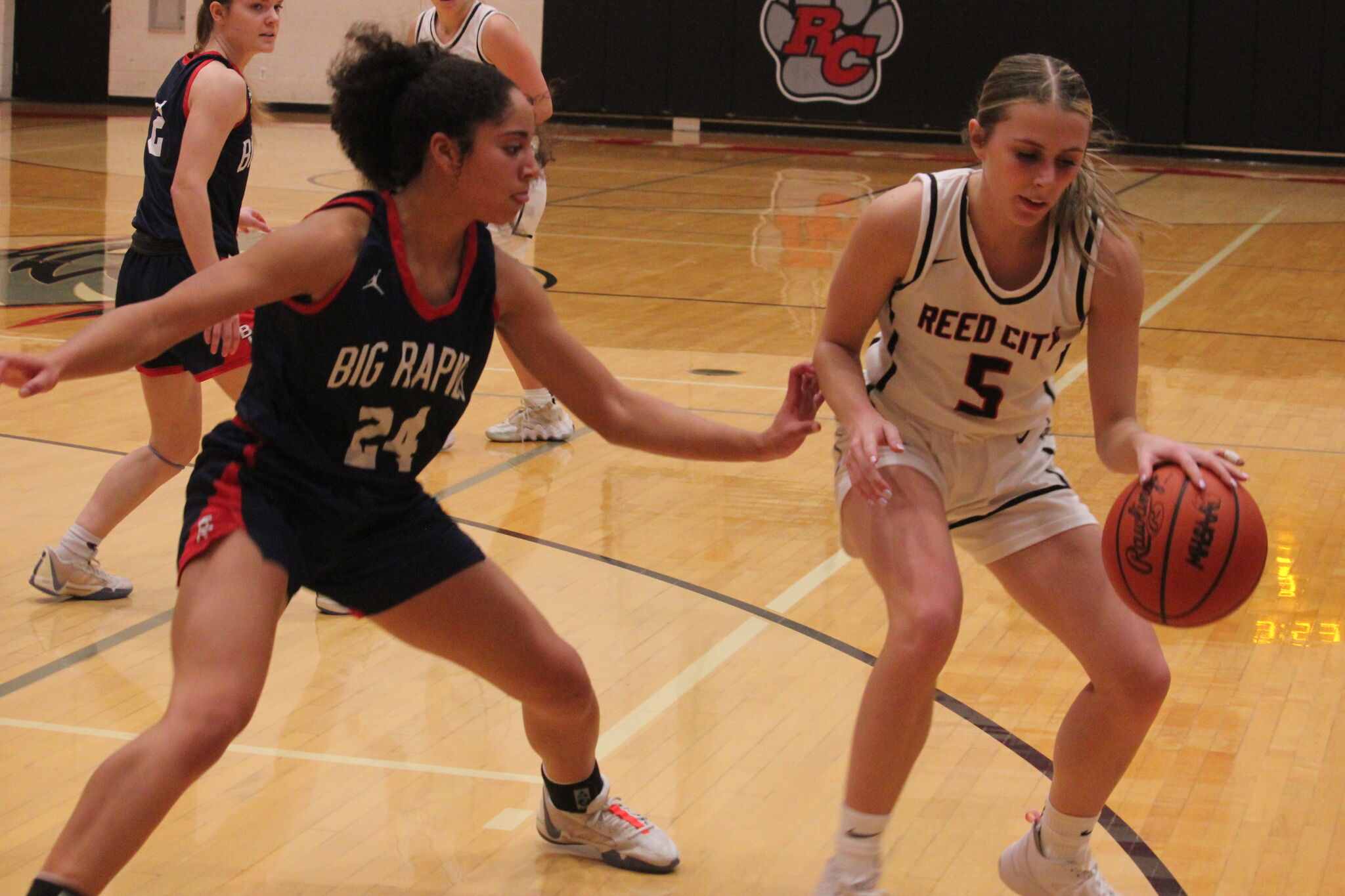 Warren playing major role for basketball Cardinals