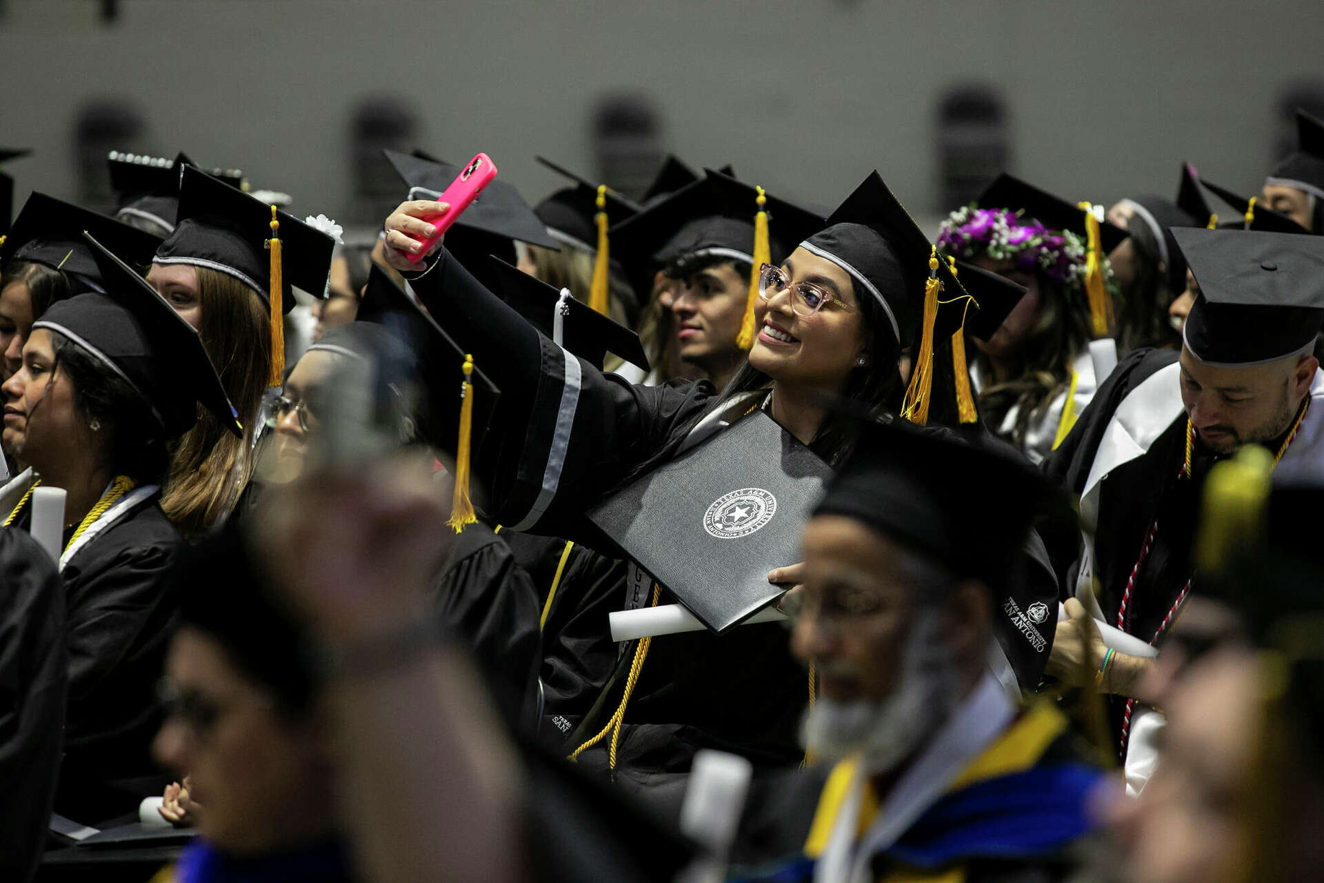 Summer heat prompts new location for San Antonio ISD graduations